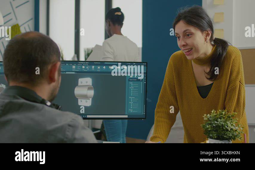 Industrial woman designer discussing with technician engineer Stock ...