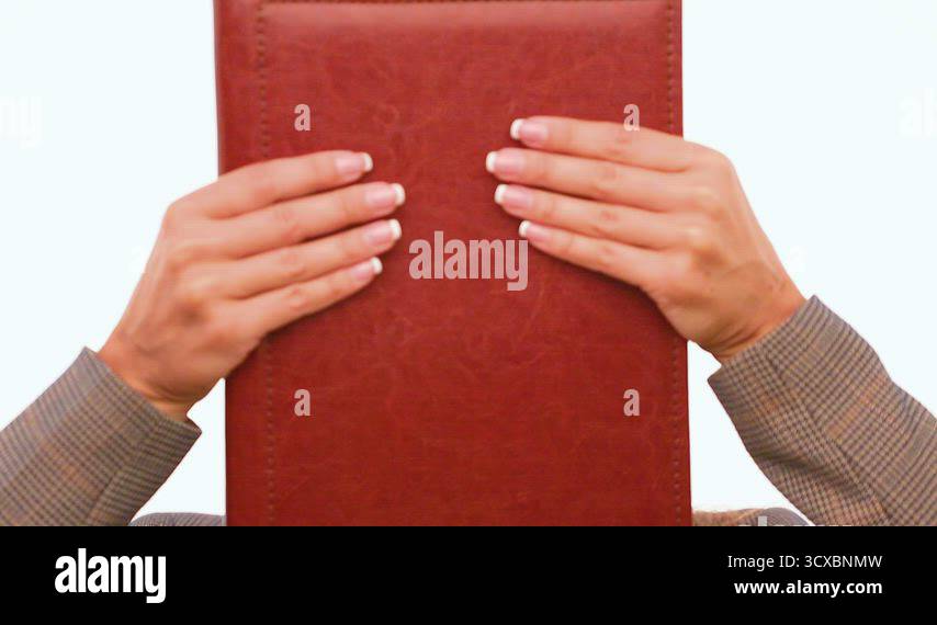 Business lady hiding behind folder Stock Video Footage - Alamy