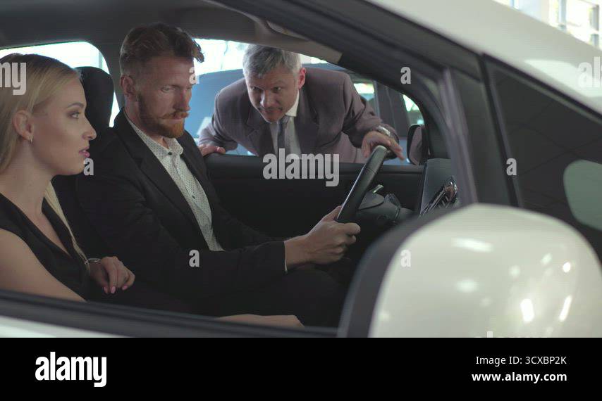 Pretty couple in auto showroom Stock Videos & Footage - HD and 4K Video ...