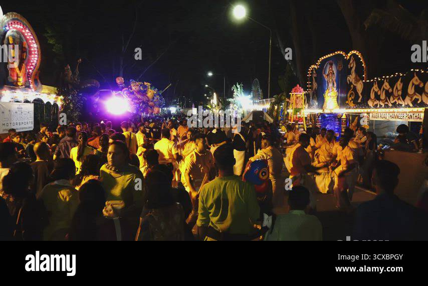 Devotees play Indian stick dance at thaneer panthal during Thaipusam ...