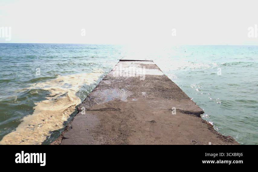Waves run on the pier in a storm. Timelapse Stock Video Footage - Alamy