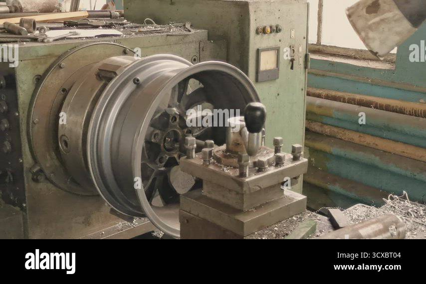 The Turning Workstation With The Alloy Wheel Rim Installed On It Stock ...