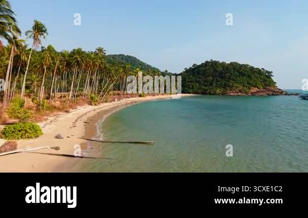 Aerial perspective revealing pristine wai chaek beach, turquoise waters ...