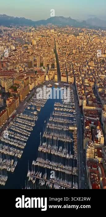 Aerial view of the city of Marseille in the morning sun. Rooftops in ...