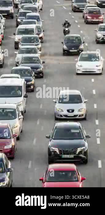 timelapse of traffic on a highway in barcelona during evening rush hour ...
