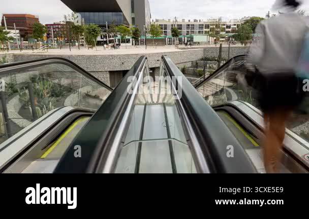 Timelapse of Glories Metro Station In Barcelona and skyline and rush of ...