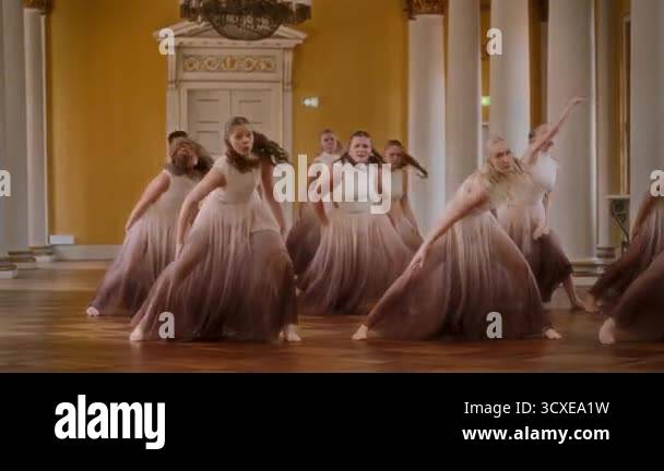 Young dancers perform modern choreography with fluidity and precision ...