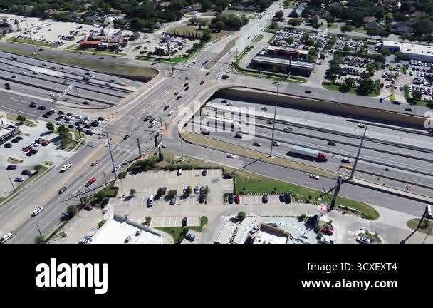 Highway interchange overpass structure, flat-roof restaurant pads, fast ...