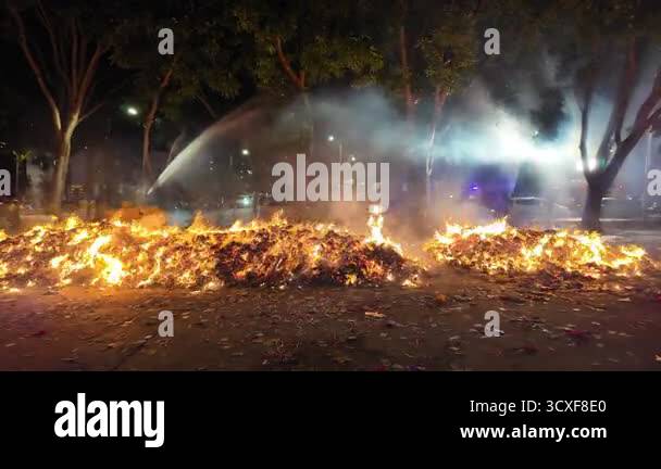 Raja Uda, Penang, Malaysia - Sep 18 2024: The burning of paper ...