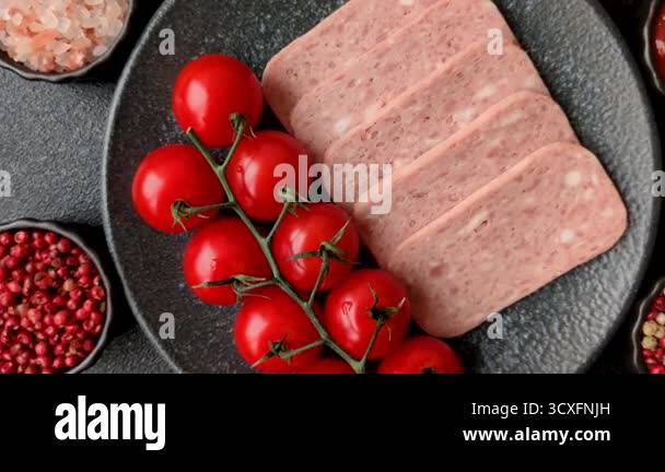Spiced ham slices, canned meat for lunch sandwiches. Spiced ham as a ...