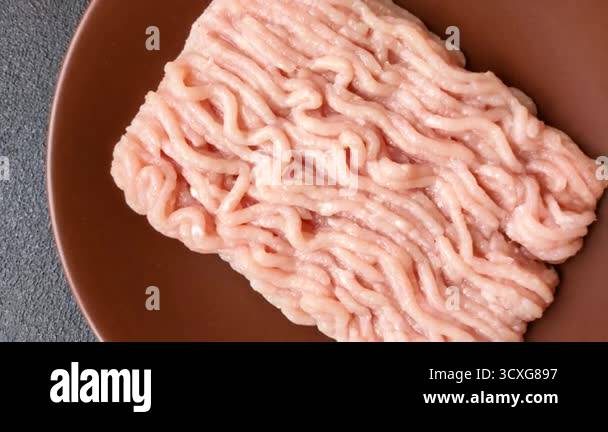 Raw minced chicken for a burger or as an ingredient in a meat dish. Raw ...