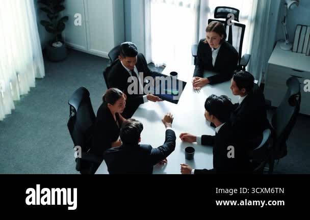 Top view of professional project manager present financial graph while ...