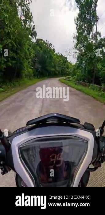 Point of view riding on a scooter motorbike in the Philippines ...