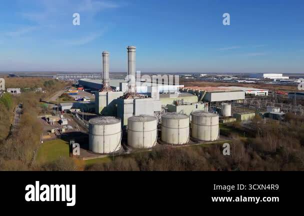 Aerial drone view of power plant, station with chimney stacks, gas ...
