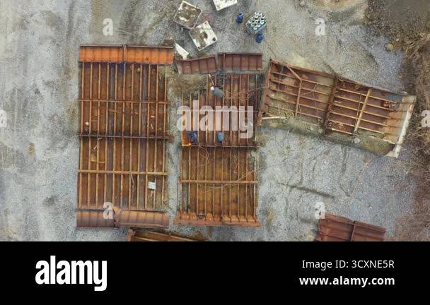 Above top view on workers as they cutting parts of old large vessel ...