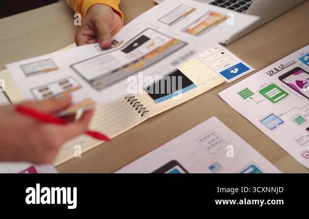 Excellent startup company employee presenting user interface prototype ...