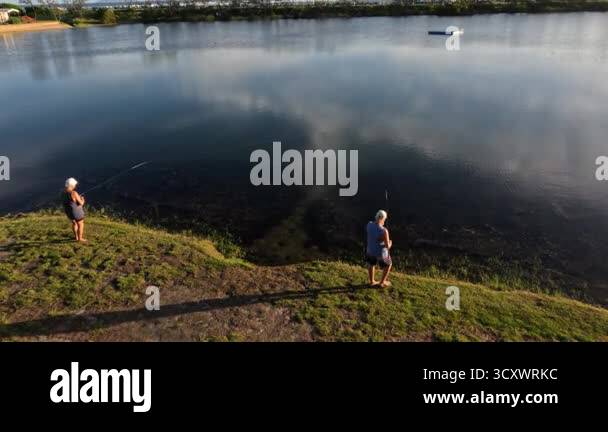 Serene lake sunset fishing Stock Videos & Footage - HD and 4K Video ...