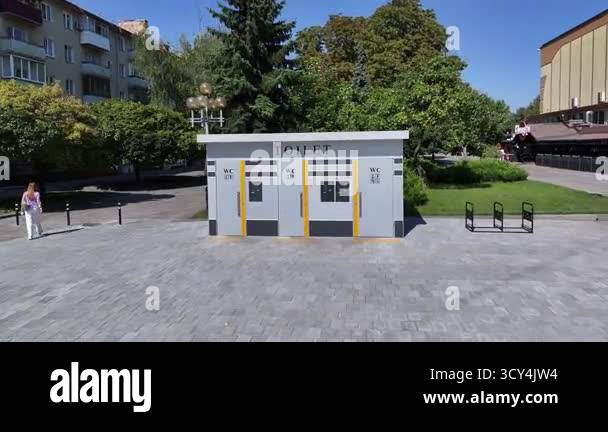 Public toilet building in city park with modern design, clean urban ...