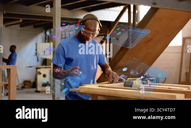 Adult male carpenter measuring beam in carpentry workshop, activating ...