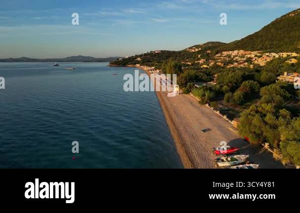 Corfu Island, Greece. Coastal scene unfolds with calm waters and sandy ...