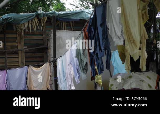 A Whistful Laundry - Colorful Clothes Fluttering in the Breeze Stock ...