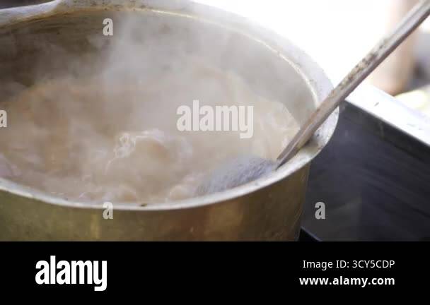 Indian Style Coffee or Tea Making - A Unique Brewing Technique Stock ...