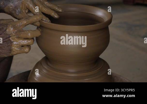 Mastering the Pottery Wheel - A Journey into the Art of Clay Stock ...