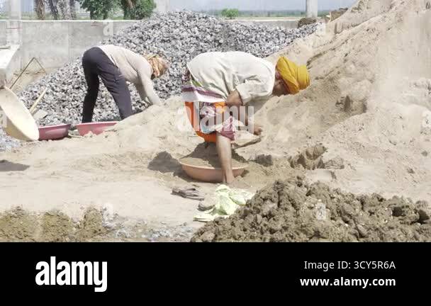 Hard Work and Tradition - Women Digging with Baskets at Construction ...