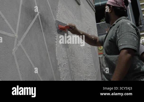 Mastering the Art - A Guide to Smooth Plastering Stock Video Footage ...