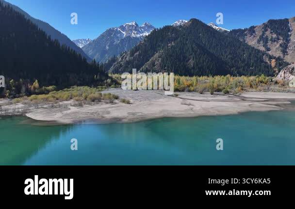 A quadcopter view of the picturesque mountain lake Issyk in the Almaty ...