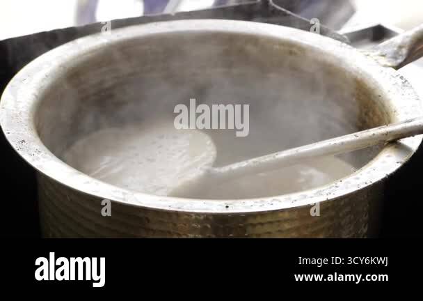 A Whiff of Indian Elegance - The Art of Tea Stirring Stock Video ...