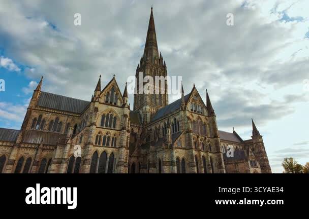 Salisbury Cathedral stands with its soaring spire piercing the sky ...