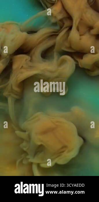 Vertical video. Smoke background. Vapor cloud. Defocused orange bronze ...