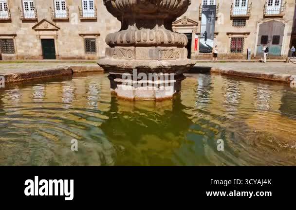 BRAGA, Portugal, 17 June 2025 - Elegant Largo do Paco Square blends historic archways flowered ...