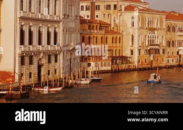 Sunrise view of the Grand Canal in Venice, Italy with serene waters ...