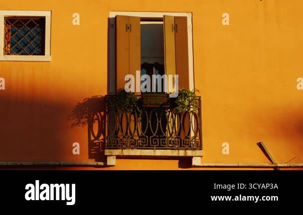 Close-up of various windows with Venetian blinds and shutters in the ...