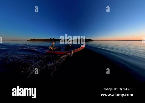 Evening boating at sunset in Manitoulin Island in Lake Huron. View of a ...