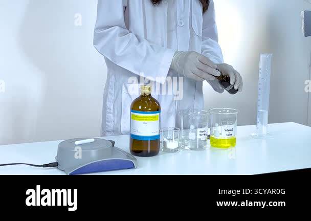 Scientist conducts iodine clock reaction with vitamin C and starch in a ...