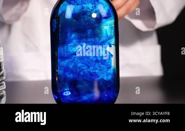 Color diffusion in a jar with shaving cream Stock Video Footage - Alamy