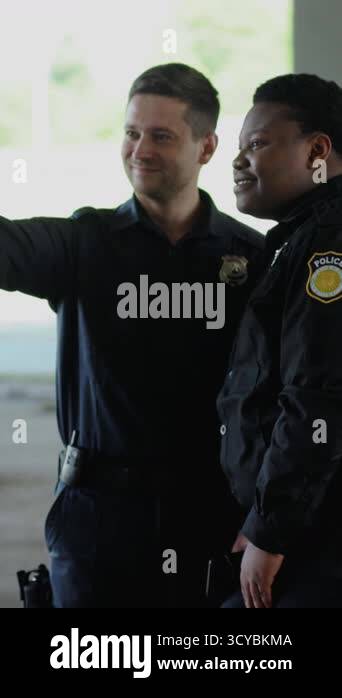 This lighthearted video displays two police officers sharing joyful ...