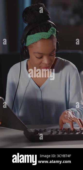 A woman showcases her music and tech skills in a creative session ...