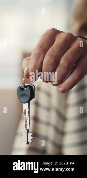 The video shows an individual with keys, symbolizing new beginnings. It ...