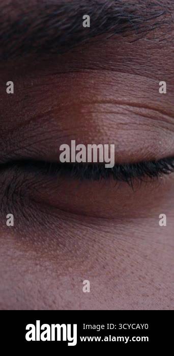 A closeup view of a completely closed eye, displaying beautifully long ...