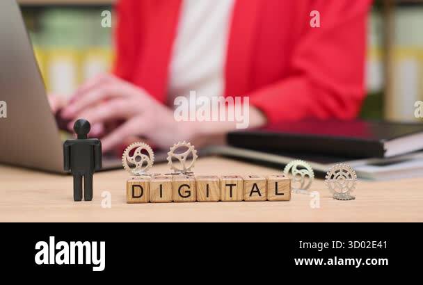 In a lively workspace, a person engages in digital creativity ...