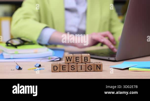 In a colorful workspace, a designer combines creativity and skill. The ...