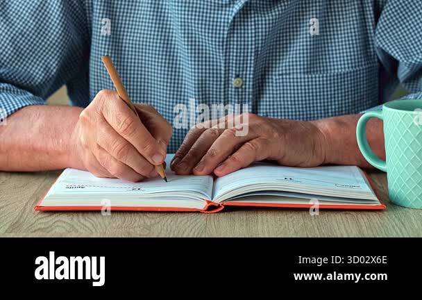 man writing on a notebook - closeup Stock Video Footage - Alamy