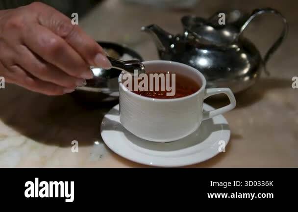 Culture, teapot and Japanese women pouring tea with traditional leaves ...