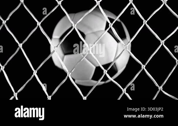 Super Slow Motion of Falling Soccer Ball into Net. Isolated on Black ...