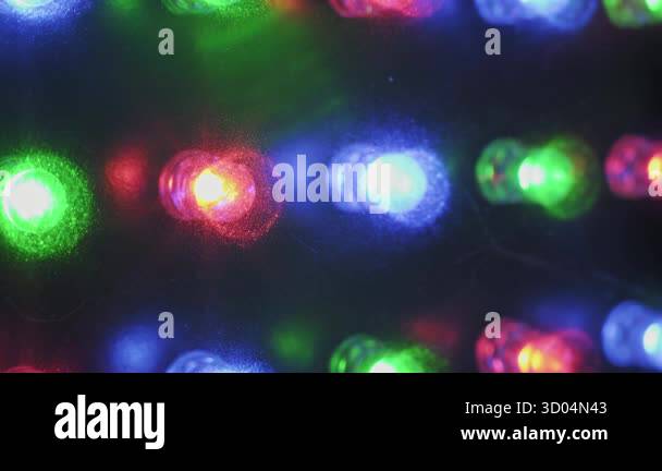 Extreme close-up horizontal shot of blinking RGB LED diodes, showing ...