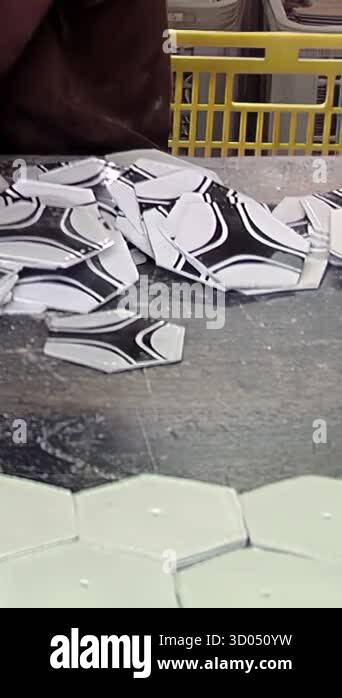 Worker Sorting Geometric Panels for Soccer Ball Assembly - Vertical 4K ...